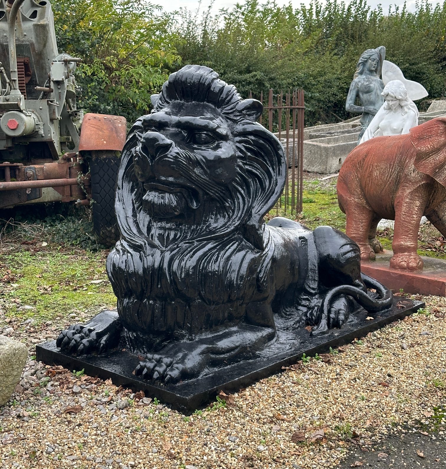 cast iron lion statues - Wells Reclamation