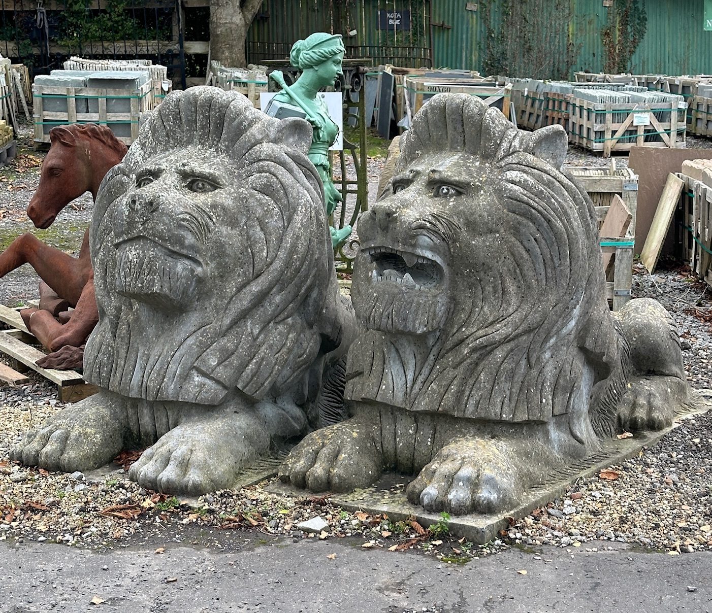 stone lion statues - Wells Reclamation