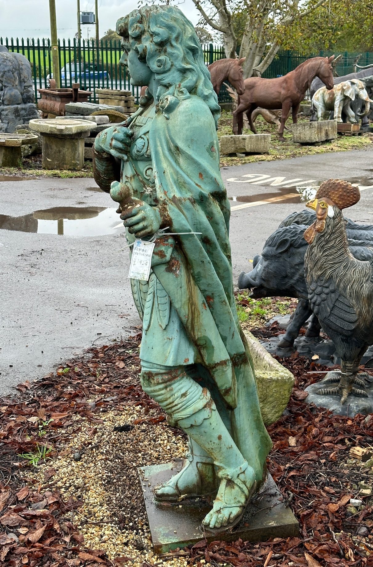 cast iron figure statue - Wells Reclamation